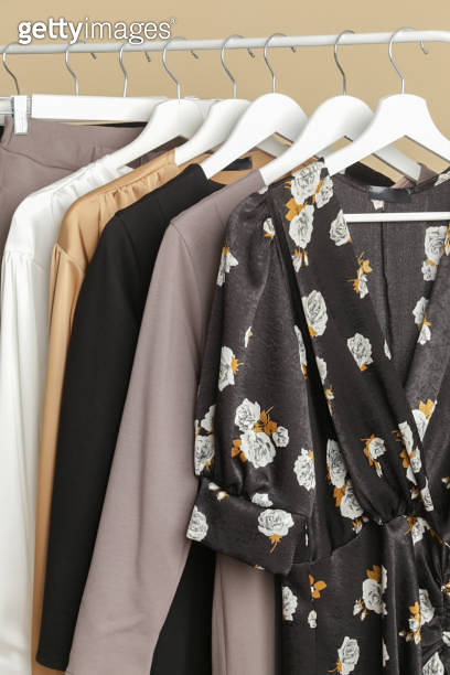 Women's Clothes. Close up image of clothes rack with stylish and ...