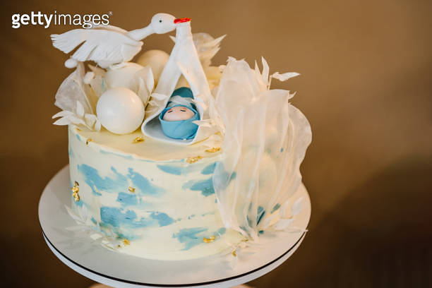 Trendy cake for a celebration of baptism. Celebration birthday party, decor. Delicious reception ...