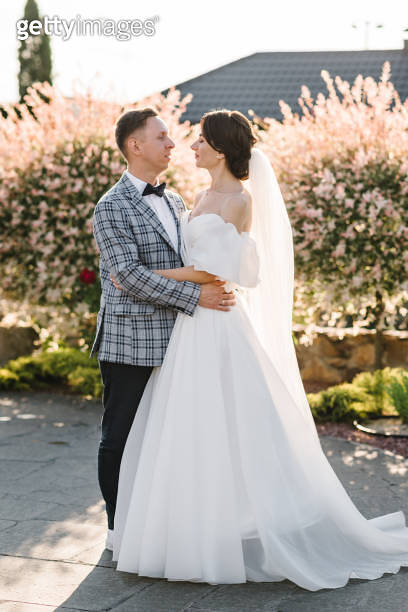 Newlyweds says promise of fidelity in love in nature. Happy bride and ...