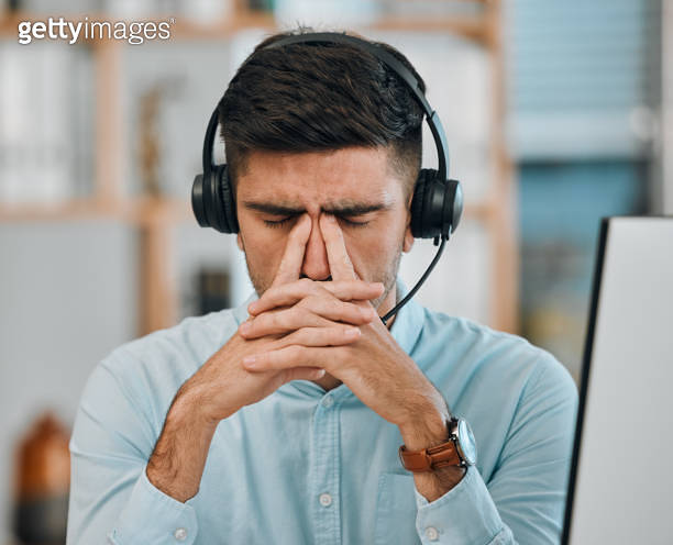 Stress, call center and headache of man in customer service agency with ...