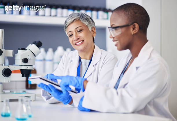 Women, science and teamwork with notes in laboratory for research ...