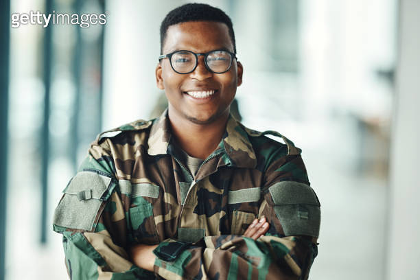 Portrait of soldier with smile, confidence and pride at army building ...