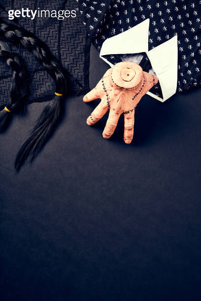 Severed hand Thing from Addams Family, Wednesday dress and hair braids ...
