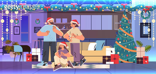 people with hearing aid disabled deaf mute family in santa claus hats ...