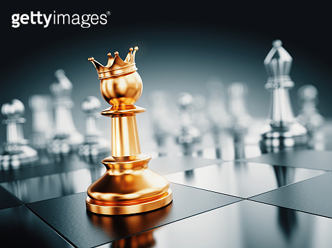 Golden chess pawnwith crown on chess board game. Success strategy ...