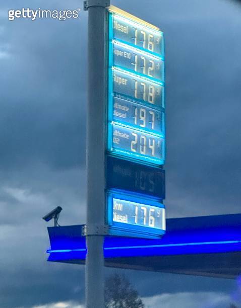 Petrol prices on blue illuminated petrol station sign 이미지 (1761743512 ...