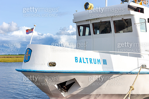 Ferry Baltrum III located at Nessmersiel, North-Sea, East Frisia. Lower ...
