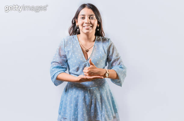 Girl gesturing help with hands in sign language. Person showing help ...