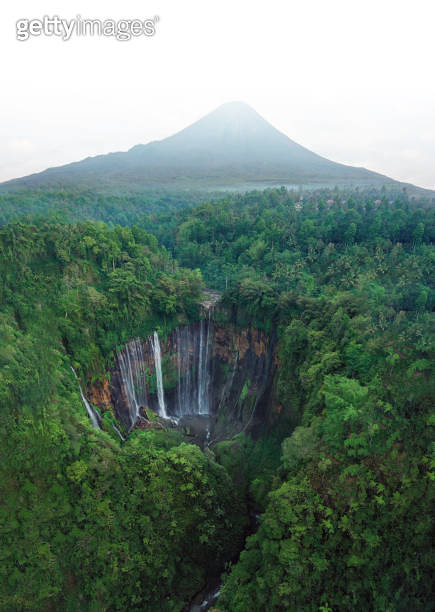 View from above, stunning aerial view of the Tumpak Sewu Waterfalls ...