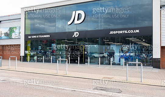 An outside view of the athletic clothes store shop JD sports entrance ...