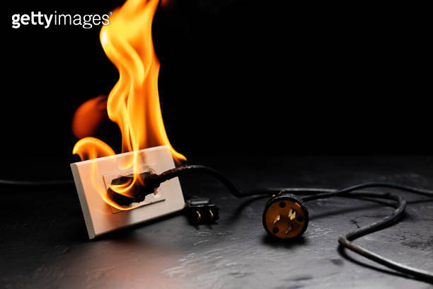 An electrical plug fire is caused by a short circuit of electrical ...