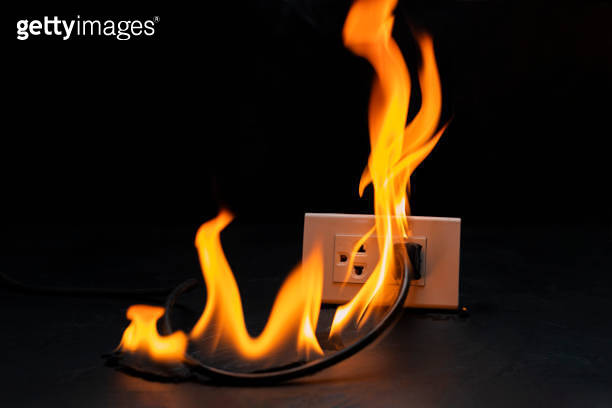 An electrical plug fire is caused by a short circuit of electrical ...