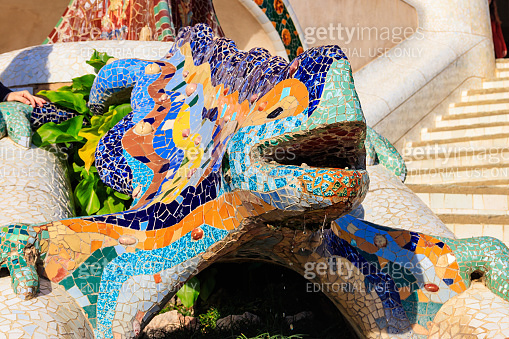 Multicolored mosaic dragon salamander of Gaudi in Park Guell, Barcelona ...