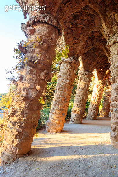 Columns designed by Antoni Gaudi in park Guell in Barcelona, Spain ...