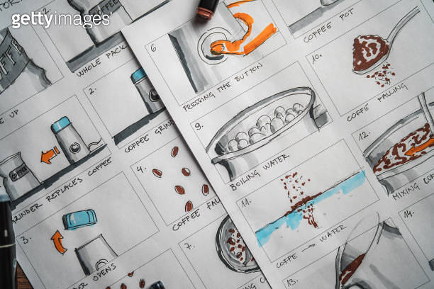 Storyboard And Colored Pencils On The Table (1480182510) - 게티이미지뱅크