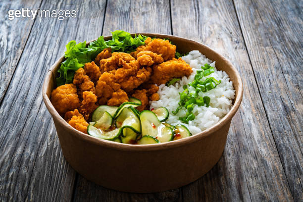 Korean fried chicken - seared breaded chicken nuggets served with white ...