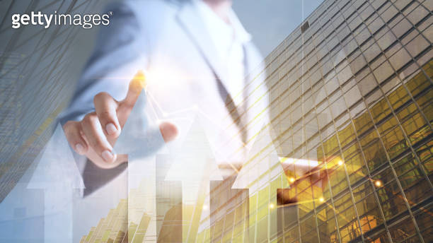 Unfamiliar businessman with clipboard working with graphs and business ...