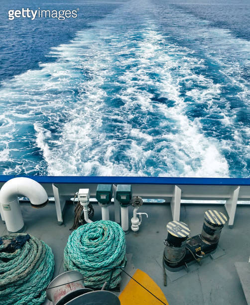 Trails on the sea of ship after it pass through, aft deck of ship ...