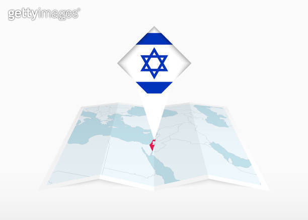 Israel is depicted on a folded paper map and pinned location marker ...