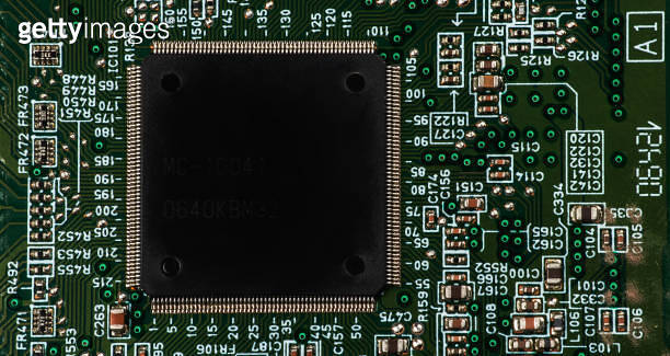 Small microprocessor, microcontroller chip on a generic modern desktop ...