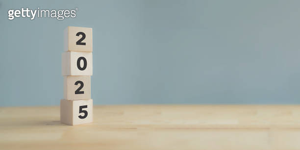 Starting new year 2025. 2025 on wooden cube blocks. Beginning and start ...