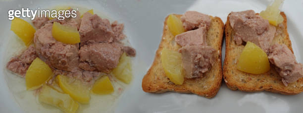 Preserved cod liver in oil served on toast with candied lemon ...
