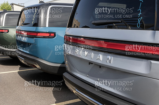 Rivian R1S SUV display. Rivian offers the R1S in Adventure, Adventure ...