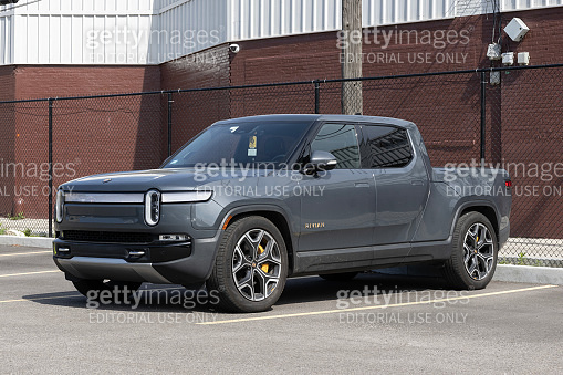 Rivian R1T pickup truck display. Rivian offers the R1T in Adventure ...