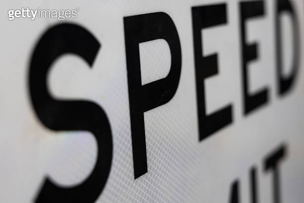 Speed Limit sign close-up with perspective and shallow depth of field ...