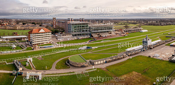 Aerial view above York Racecourse showing the home straight and ...