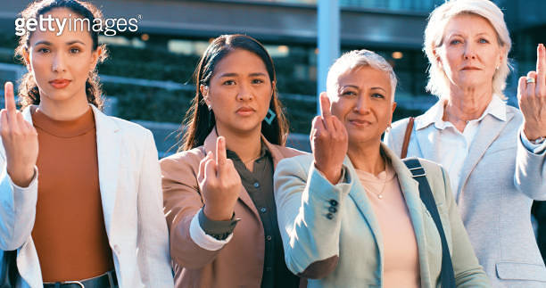 Diverse Group of Serious Women Making a Bold Statement with Middle ...