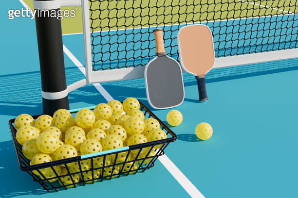 Pickleball paddles rackets and balls in a basket, court net. 3D ...