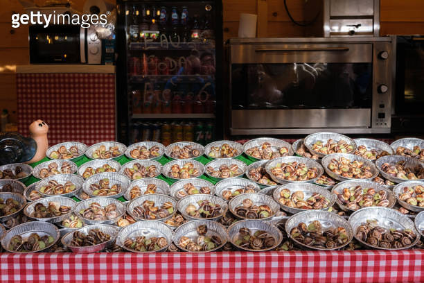 Escargots de Bourgogne, typical French dish of snails with butter and ...
