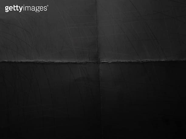 digital macro photo of paper with dark printer ink on it. test print ...