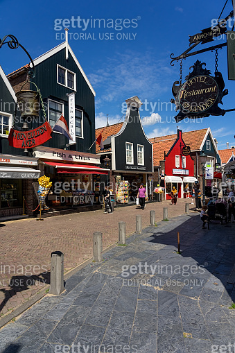 Beautiful fishing village of Volendam with with its typical houses in a ...