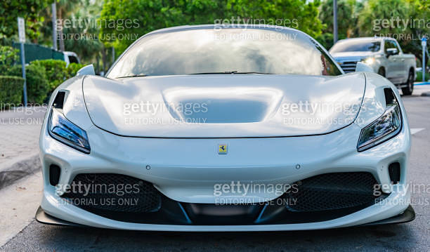 Ferrari F8 Tributo at miami beach. White Ferrari F8 Tributo i s ...