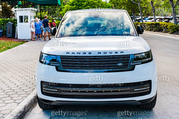 Range Rover luxury SUV crossover at miami beach. white suv Range rover ...