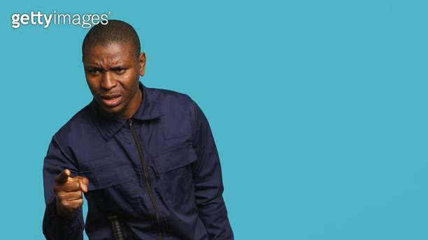 Bored security guard preventing criminal activity, patrolling around ...