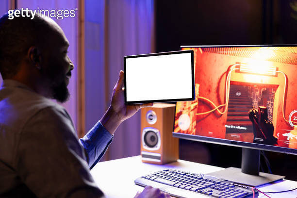 Isolated screen portable device used by person enjoying singleplayer ...