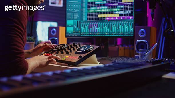 Sound engineer mixing and mastering sounds with electronic audio ... Sound engineer mixing and mastering sounds with electronic audio ...