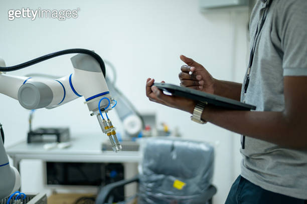 Trainee Robotics engineer learning with Programming and Manipulating ...