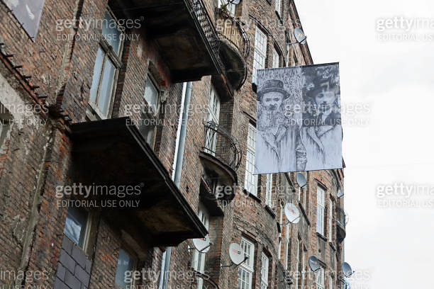 View of the tenement house with portraits of Jews during the ...
