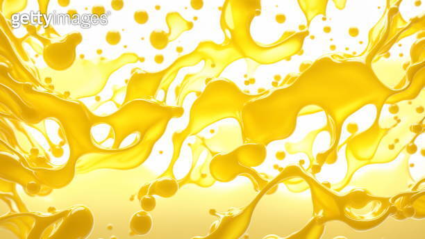 Close-up yellow juice liquid splashing against a white background, creating dynamic, abstract ...