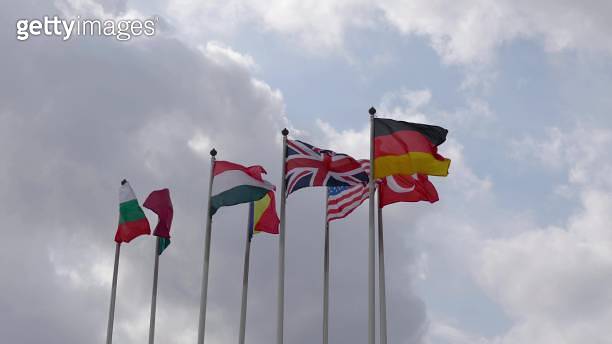 Various national flags with the EU flag under a blue sky. 이미지 ...