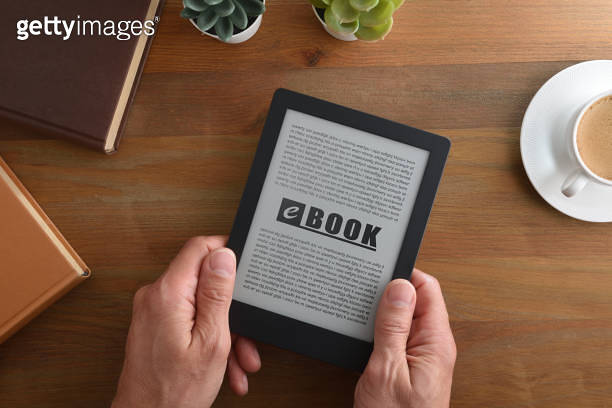 Person reading an ebook relaxed with a coffee at home 이미지 (2158671556 ...