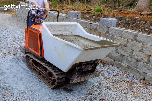 Utilizing rubber track self dumping concrete truck to transport ...
