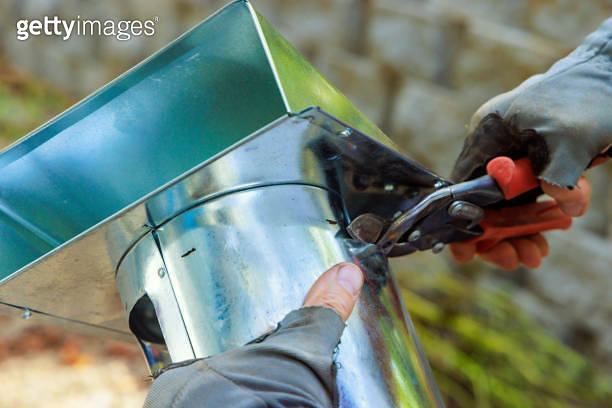 Preparation installation of an external extractor galvanized steel air ...