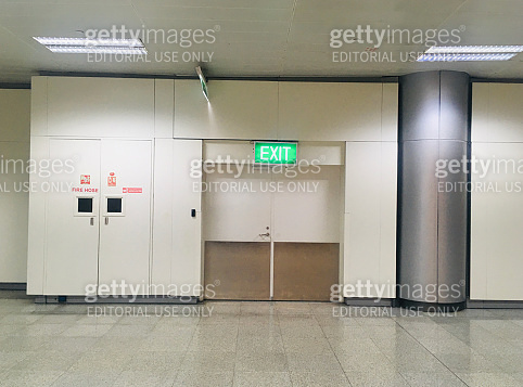 Exit Door with Signage at Departure Hall of New Terminal Extension at ...