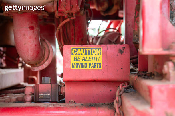 Caution moving part inside the machine. 이미지 (2159020916) - 게티이미지뱅크