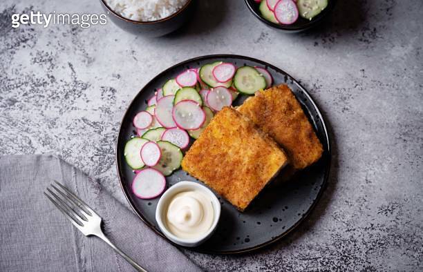 Fried pollock fish with cream sauce and cucumber and radish salad 이미지 ...